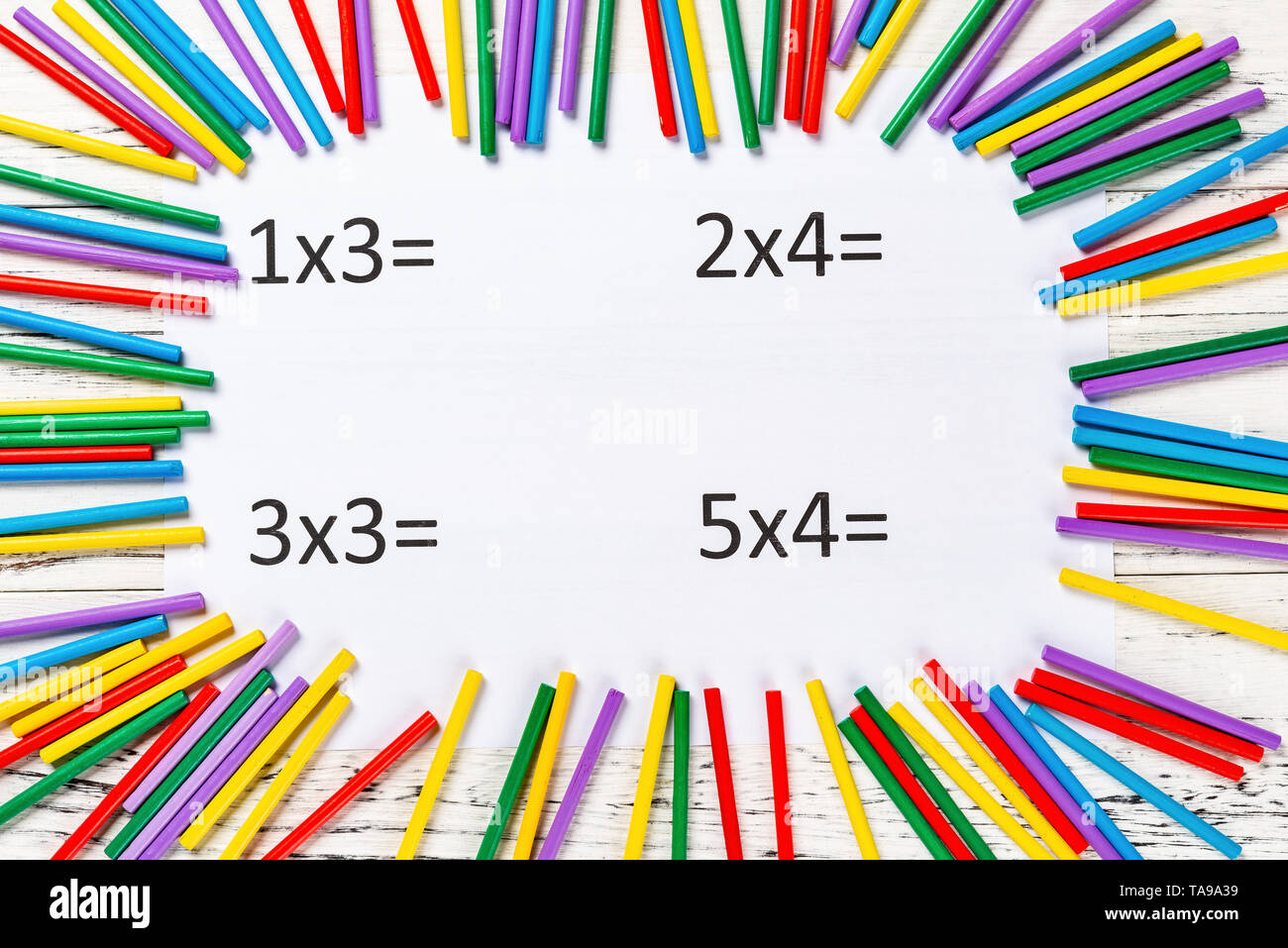 top view multiplication equations with colorful counting rods Stock ...