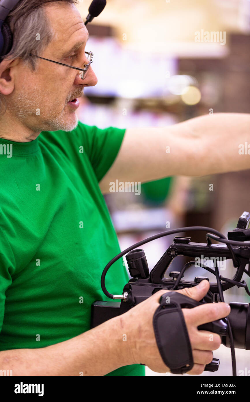 Shooting video tv program in hi-res stock photography and images - Alamy
