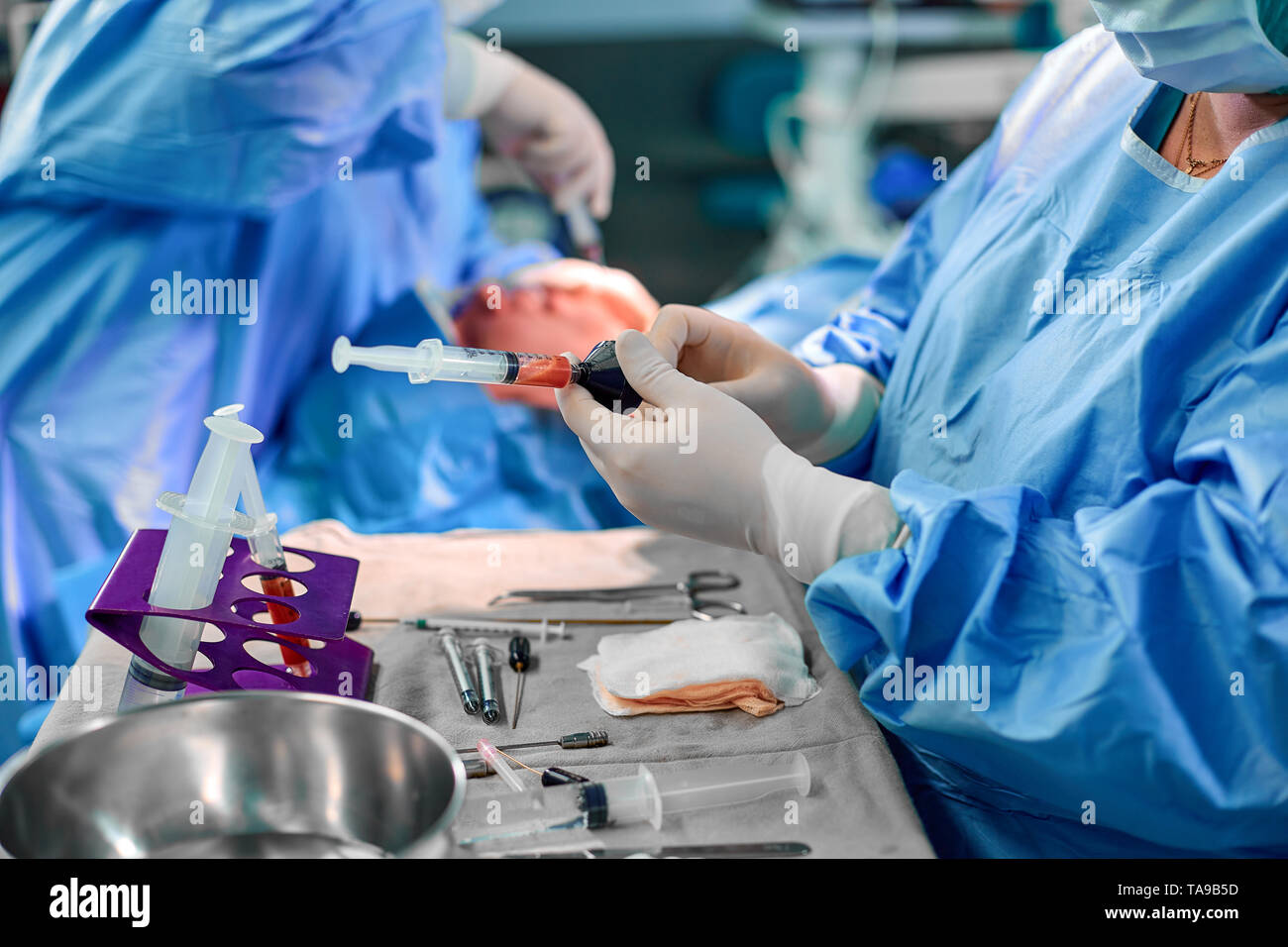 Hands Holding Syringe and Transfer Fat with Nano Fat Transfer Tool in ...