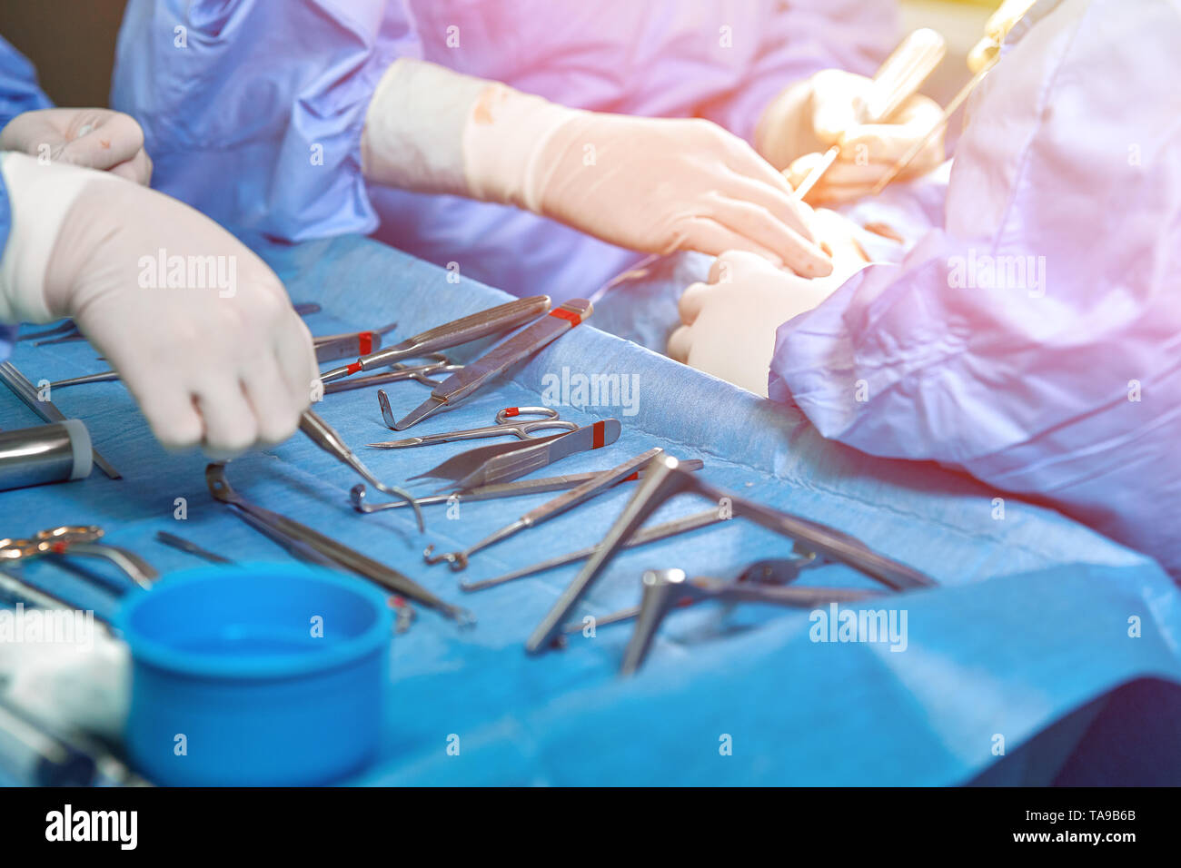 Close up of doctor hands during surgery in operation room. Sterile ...