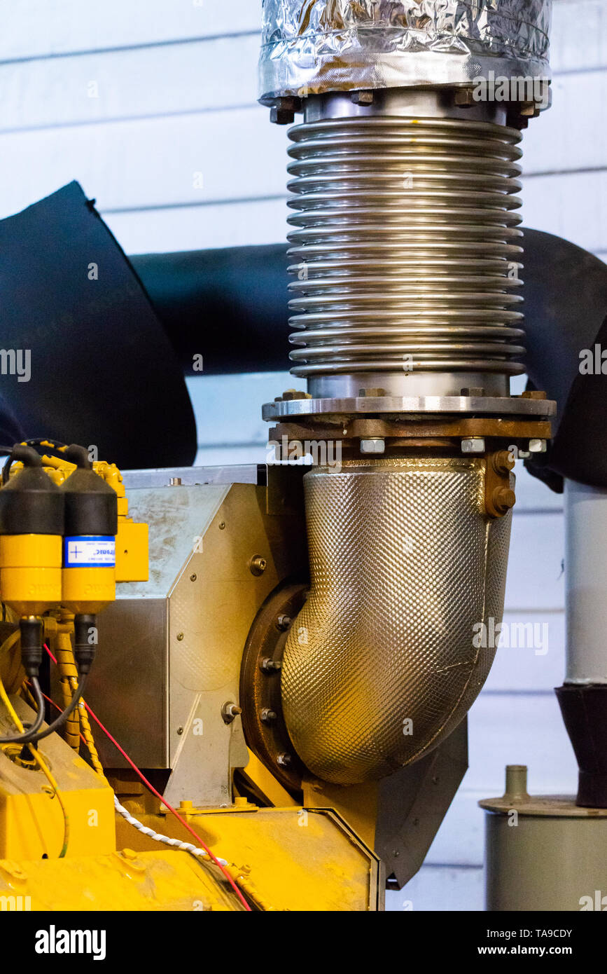 Flexible tubular exhaust pipe. Engine Exhaust Compensator Stock Photo ...