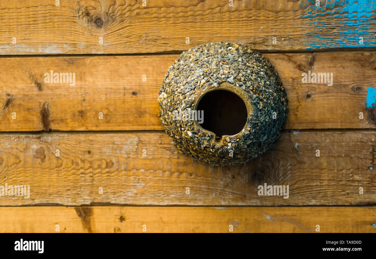 cylinder shaped bird house decorated with pebble stones, bird home ...