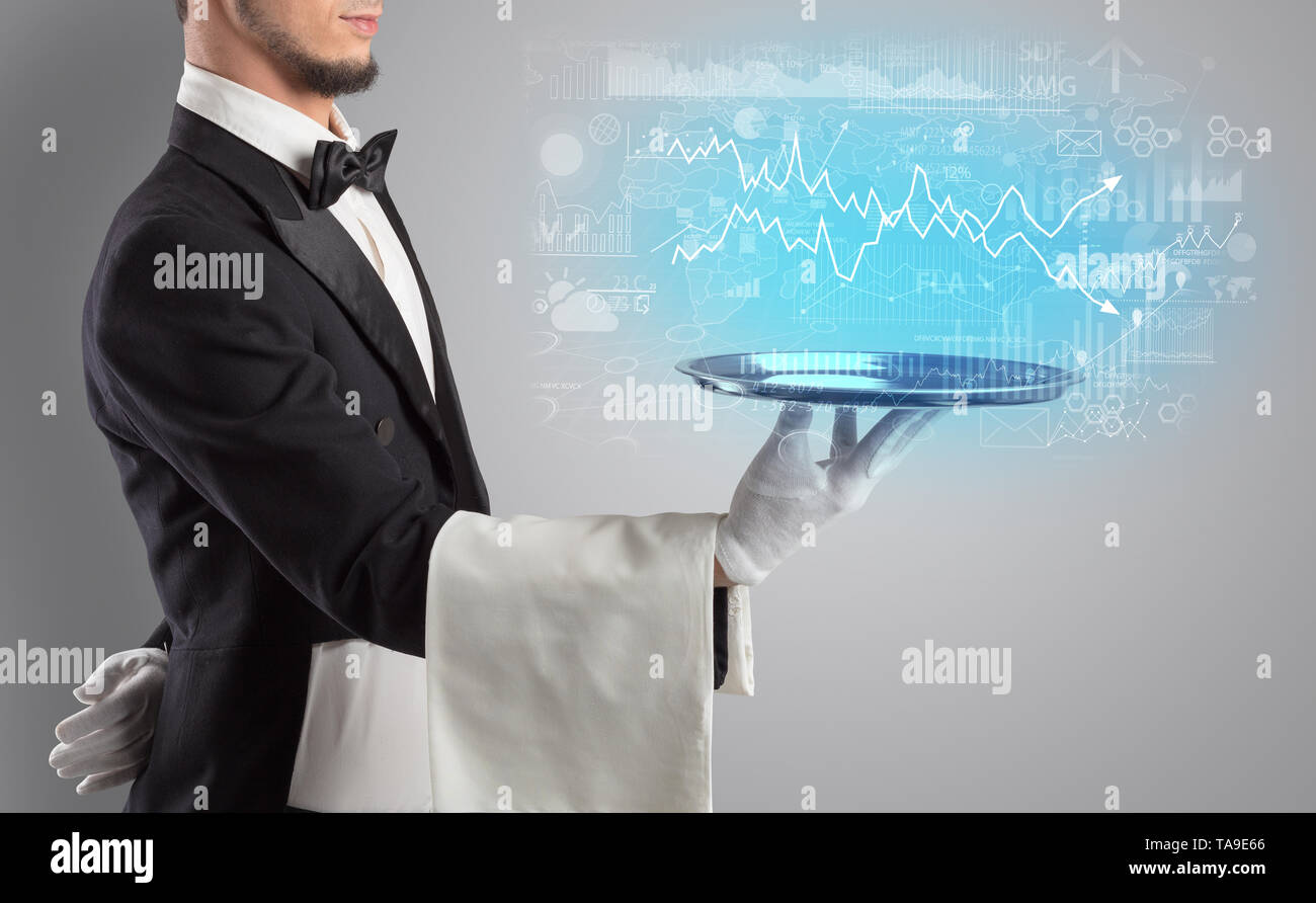 Waiter serving fluctuation concept and charts on a tray Stock Photo - Alamy