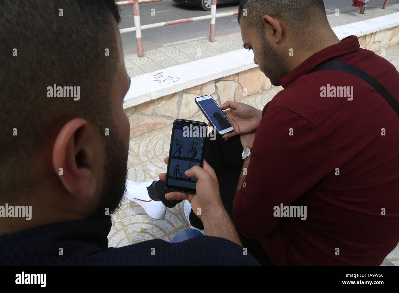 Gaza. 22nd May, 2019. Palestinian young men Amin Abed (R) and Mohammed ...