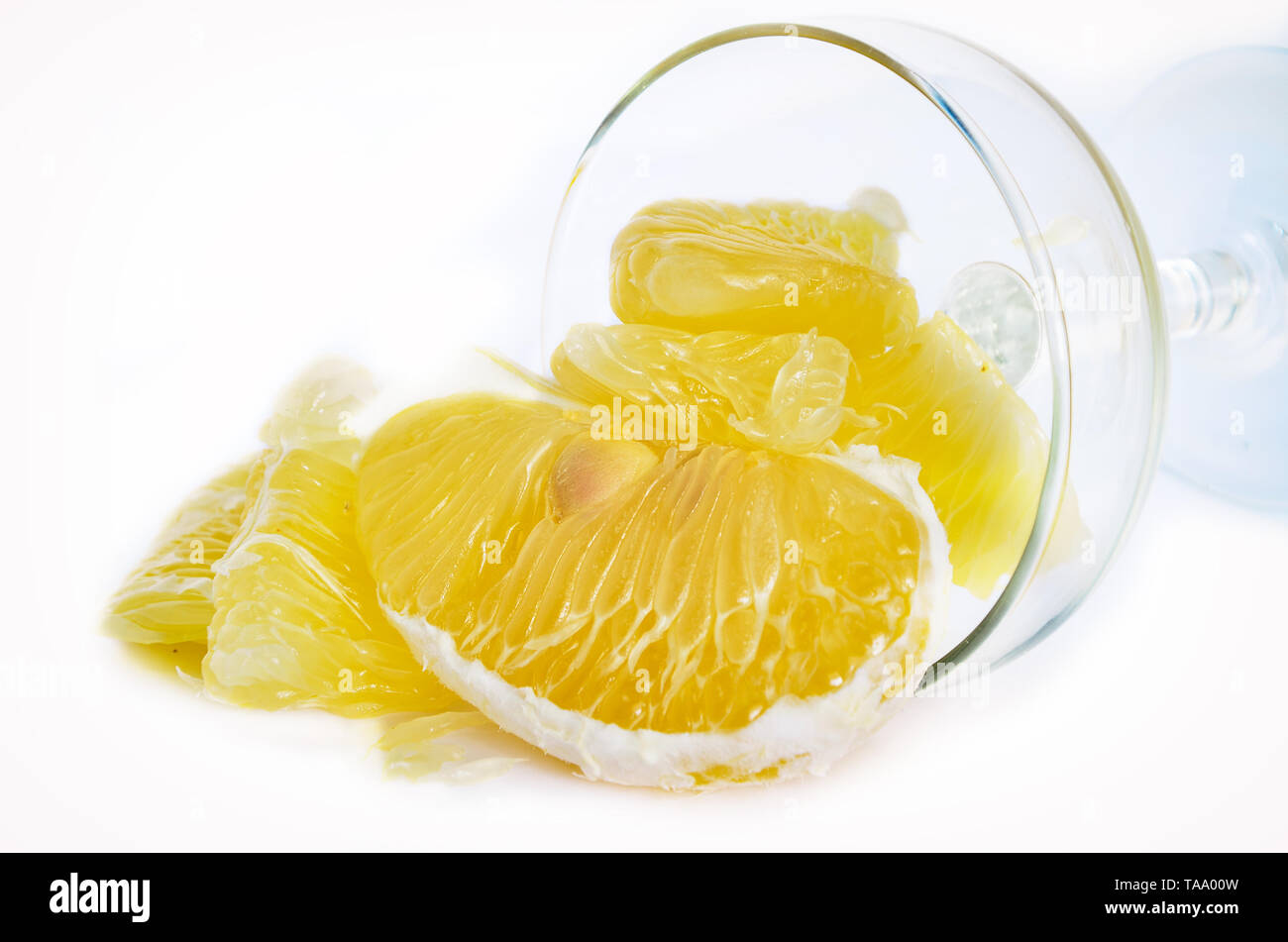 Fresh piece of pamelo on white background Stock Photo - Alamy
