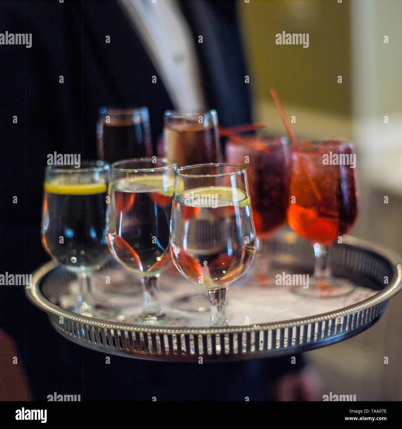 Server with Tray of Drinks Stock Photo - Alamy