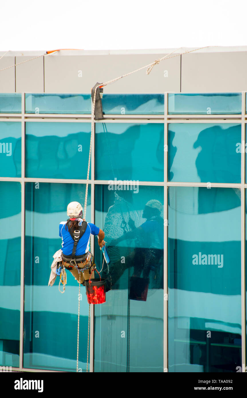 Windows Cleaning on City Building Stock Photo - Alamy
