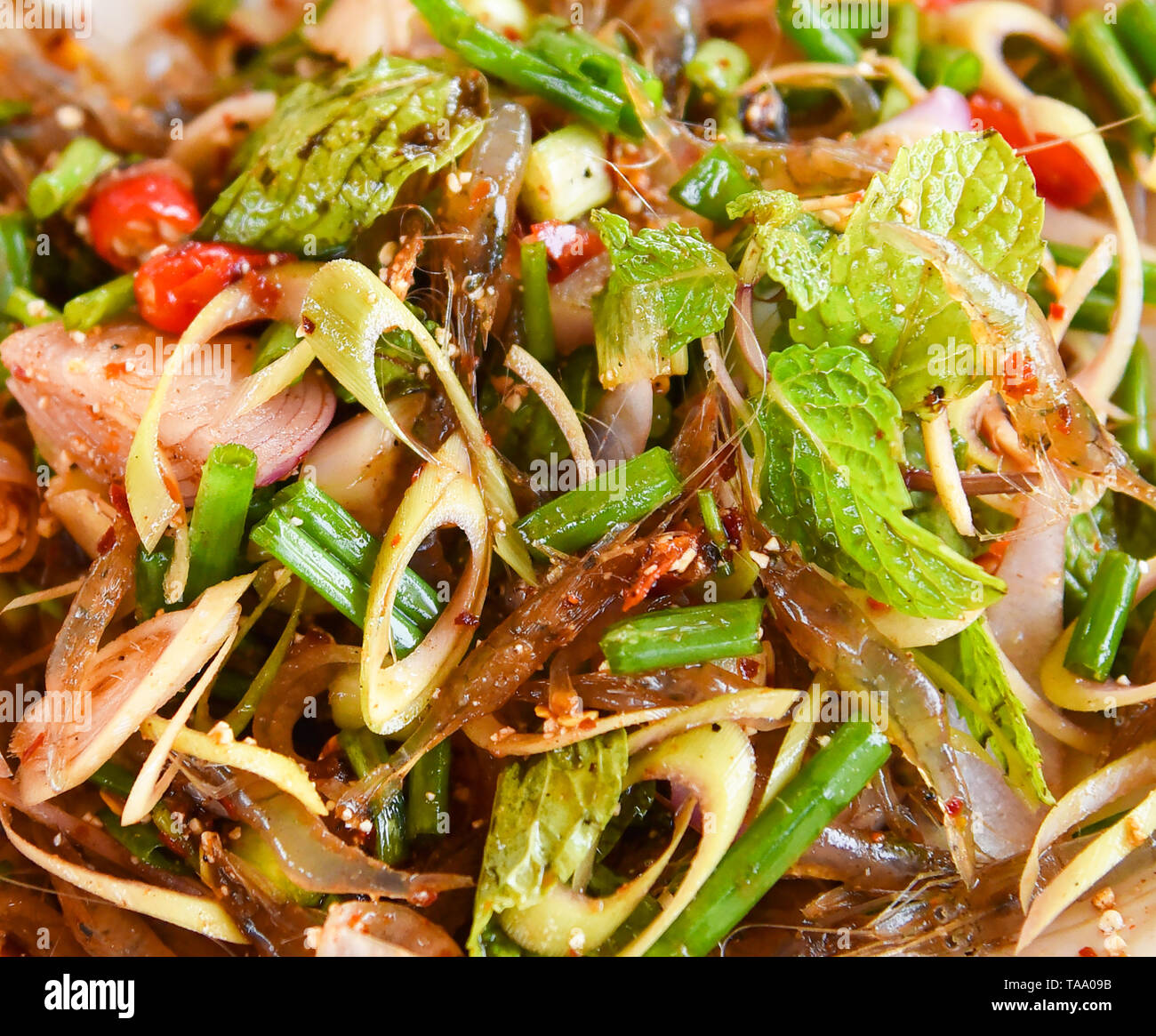 food of thai spicy salad raw shrimp alive with herbs and spices ...