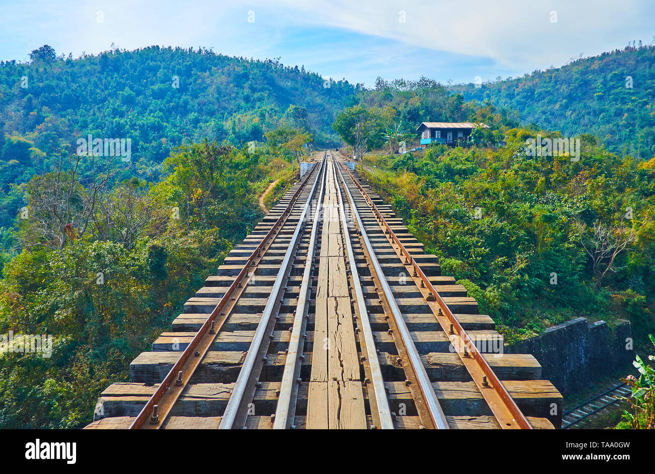 The old arched Bawa Than Tha Yar Bridge is the popular tourist landmark ...