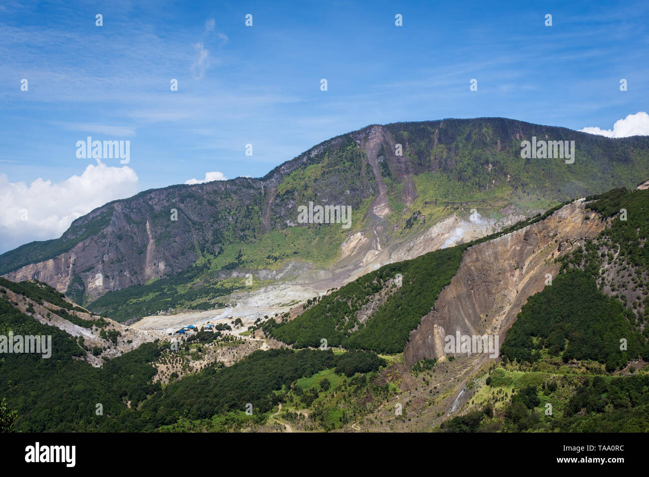 A scenic view of mountain Papandayan with clear blue sky. The view of ... A scenic view of mountain Papandayan with clear blue sky. The view of ...