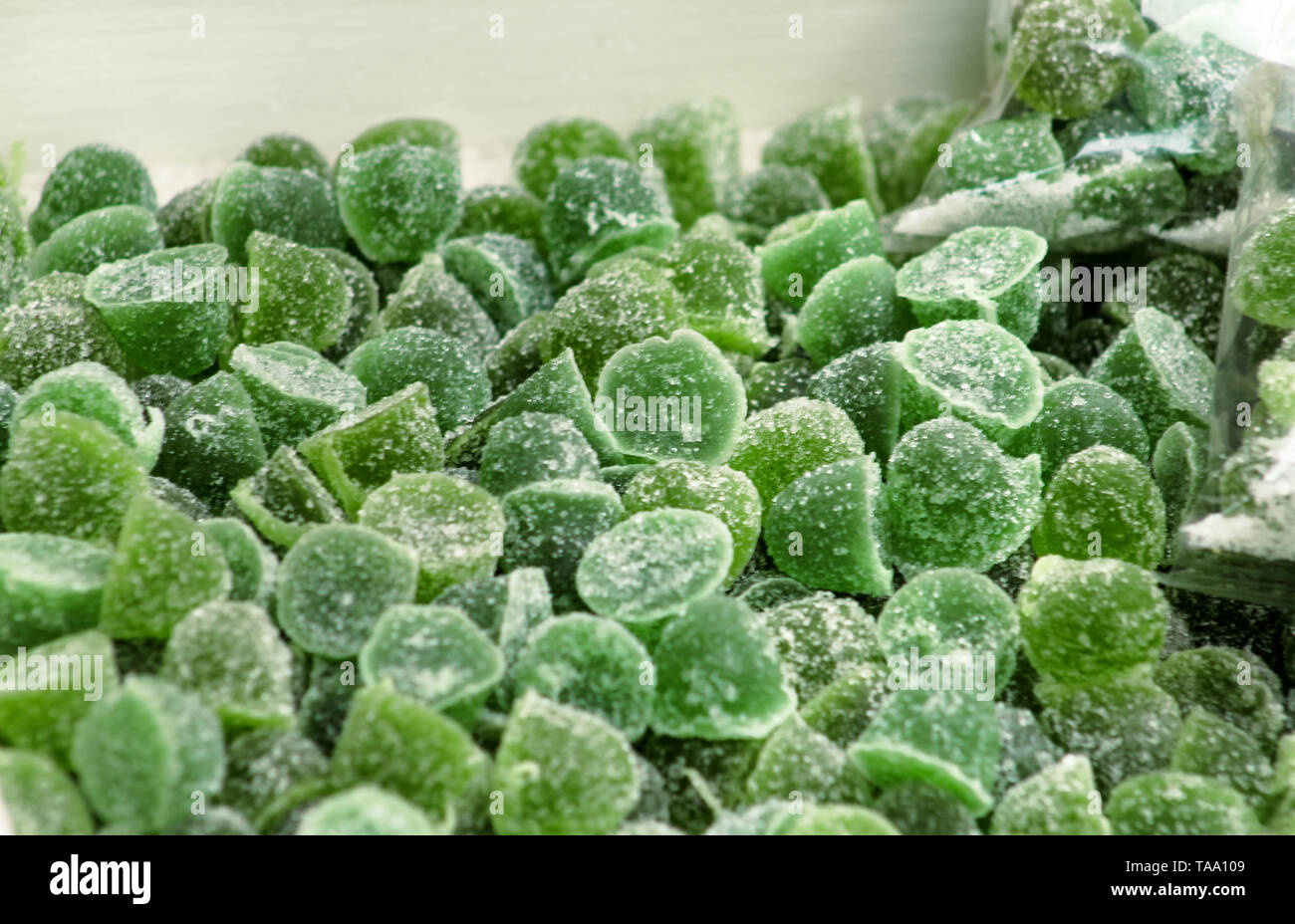 Green sugar jelly candy. Many gelatin sweet green fruit candy flavor of ...