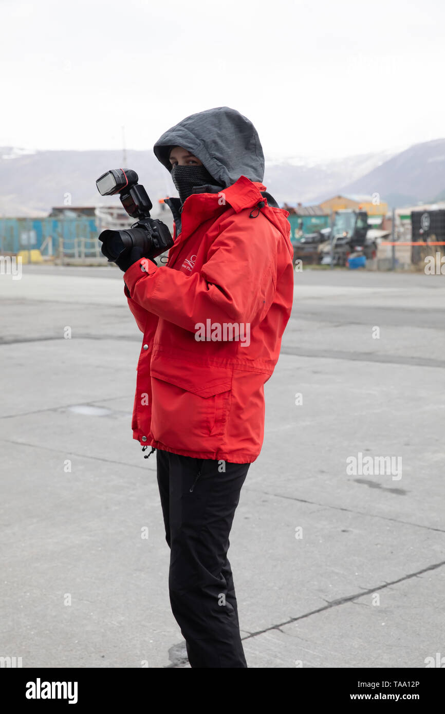 Wrapped up against the elements hi-res stock photography and images - Alamy