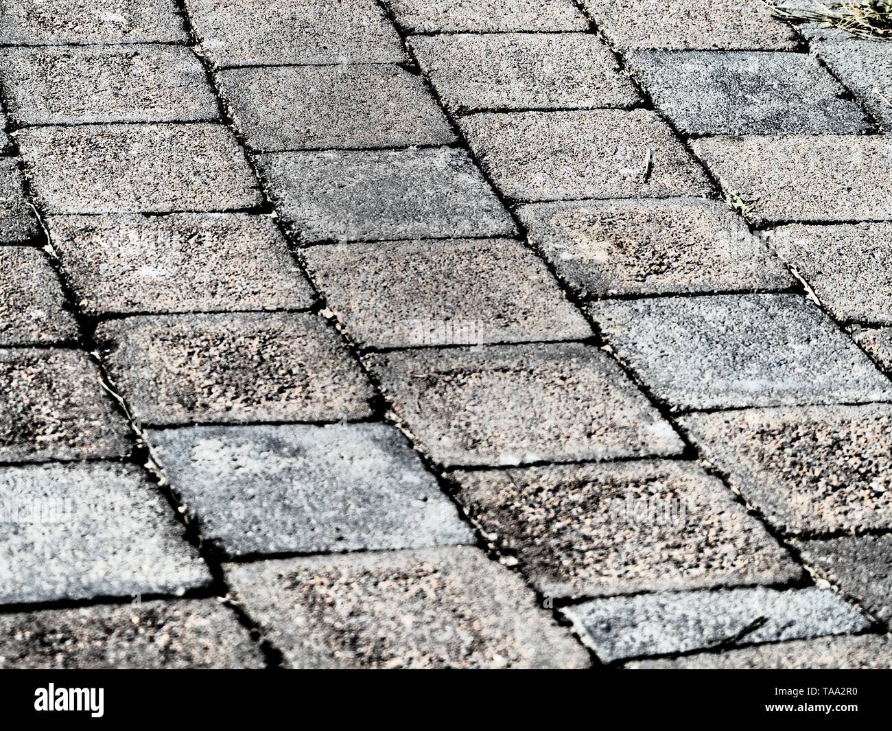 Paving footpath up close Stock Photo - Alamy
