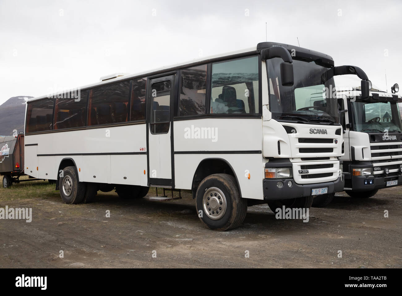 White Bus with large snow wheels in isafjordour, Iceland Stock Photo ...