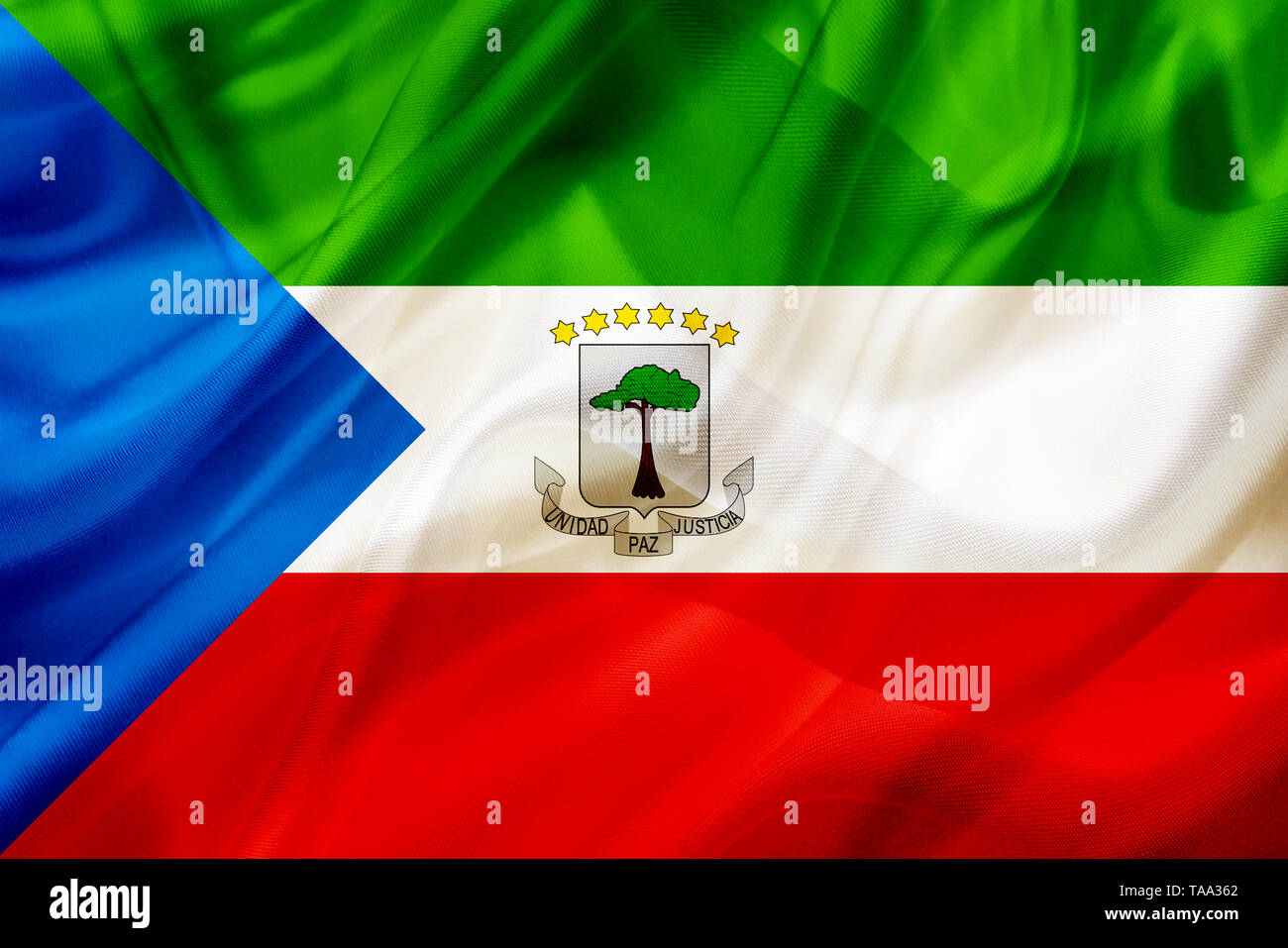 Equatorial Guinea country flag symbol on silk or silky waving texture ...