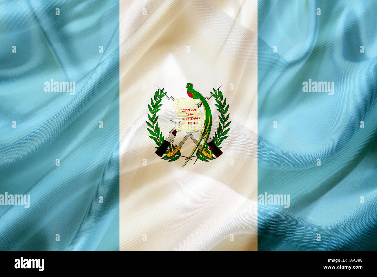 Guatemala country flag symbol on silk or silky waving texture. Smooth ...