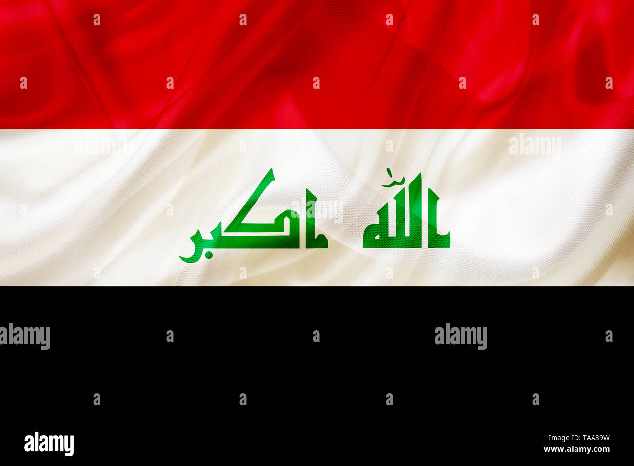 Iraq country flag symbol on silk or silky waving texture. Smooth fabric ...