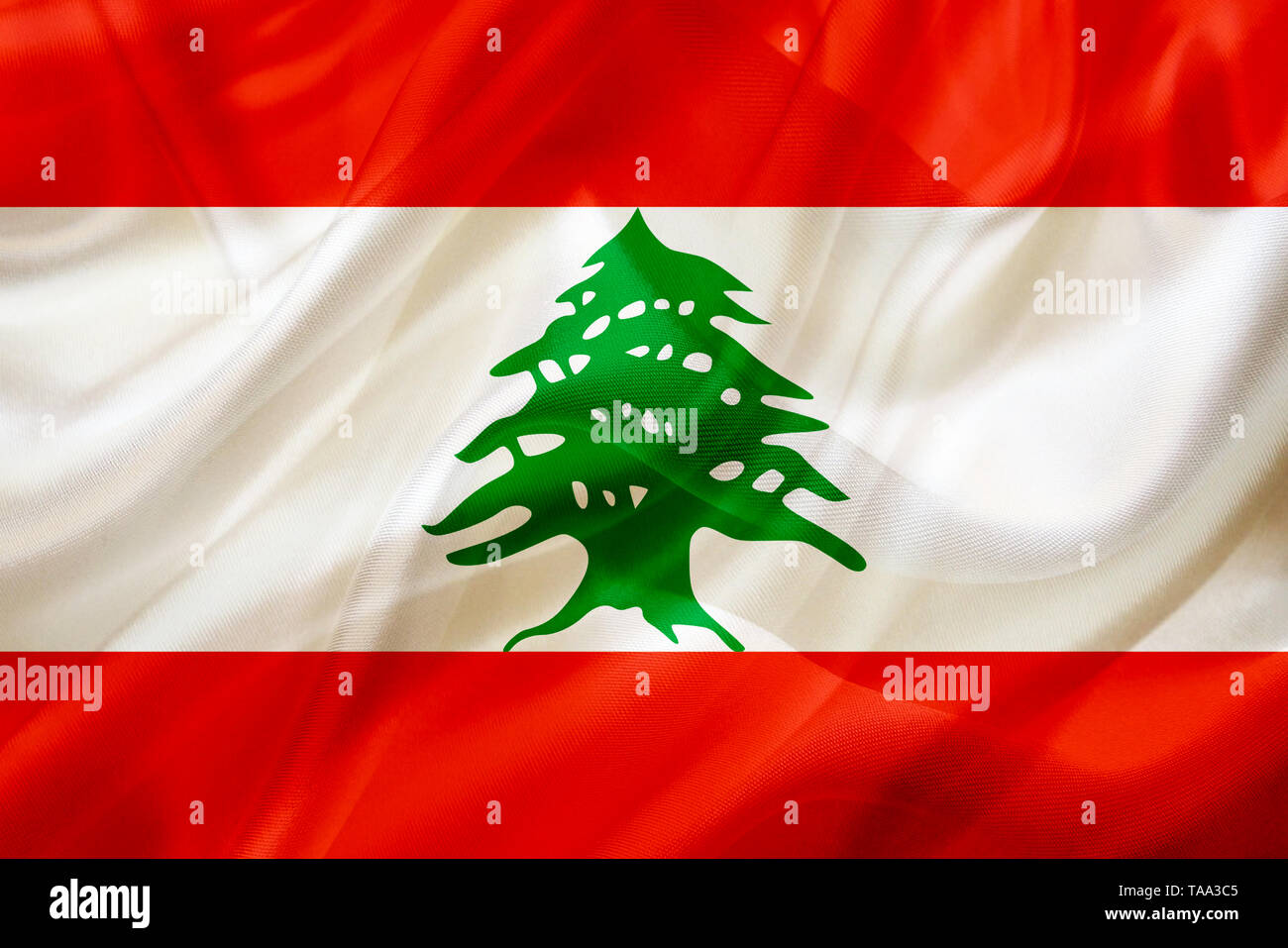 Lebanon country flag symbol on silk or silky waving texture. Smooth ...