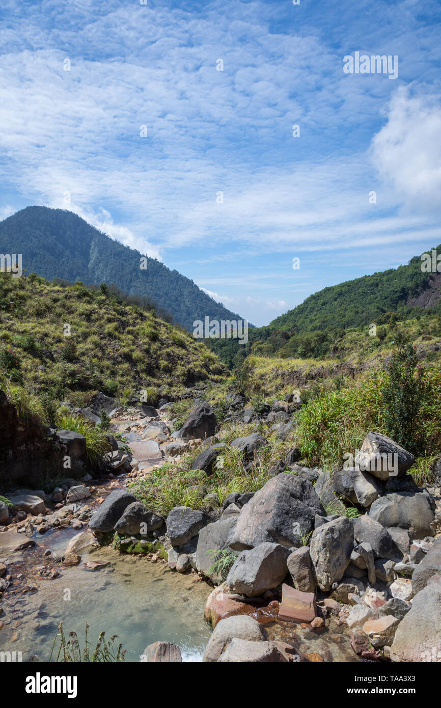 Rocky stream with clear water on a mountain. Beautiful landscape of ... Rocky stream with clear water on a mountain. Beautiful landscape of ...