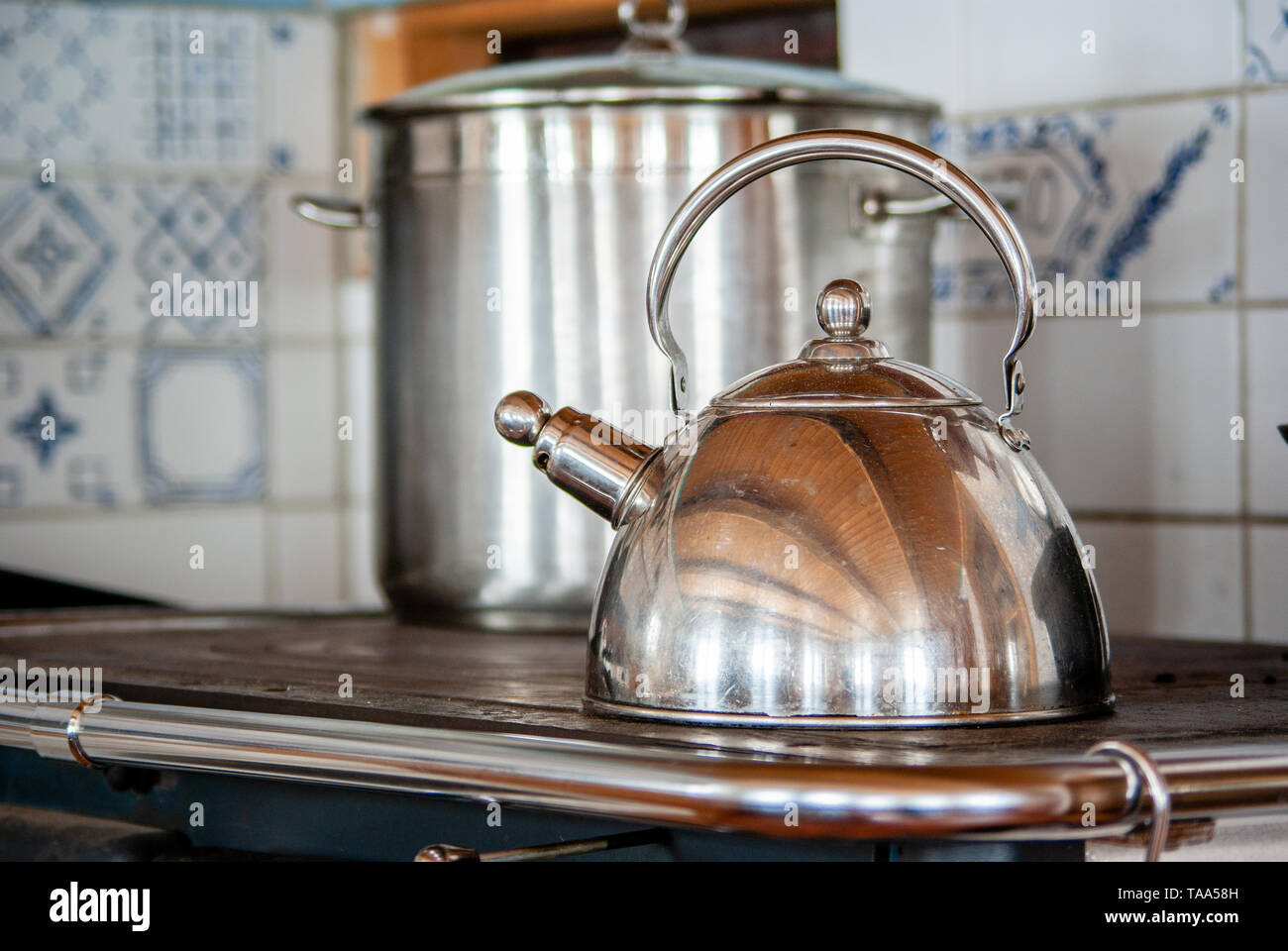 pot and kettle on the wood fired stove Stock Photo - Alamy