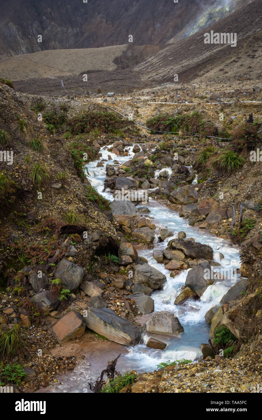 Rocky stream with white water on a mountain. Beautiful landscape of ... Rocky stream with white water on a mountain. Beautiful landscape of ...