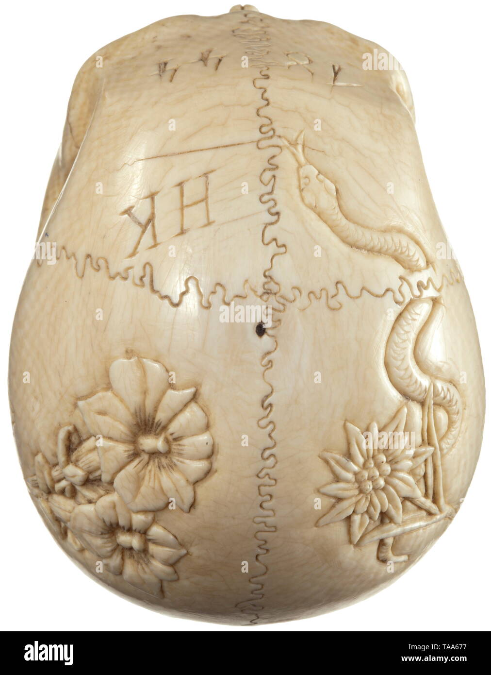 A South German carved ivory skull, dated 1844 Detailed, carved head ...