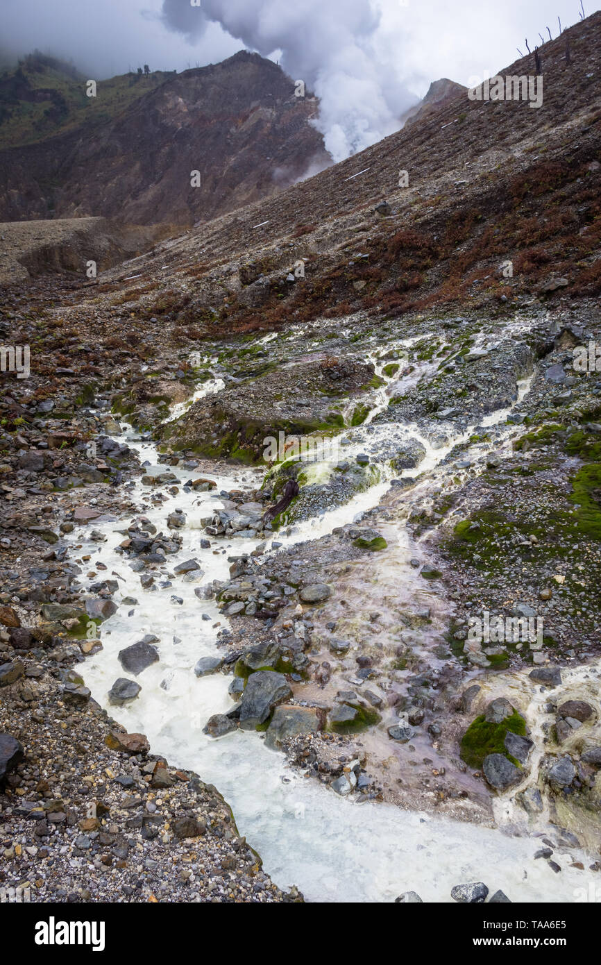 Rocky stream with white water on a mountain. Beautiful landscape of ... Rocky stream with white water on a mountain. Beautiful landscape of ...