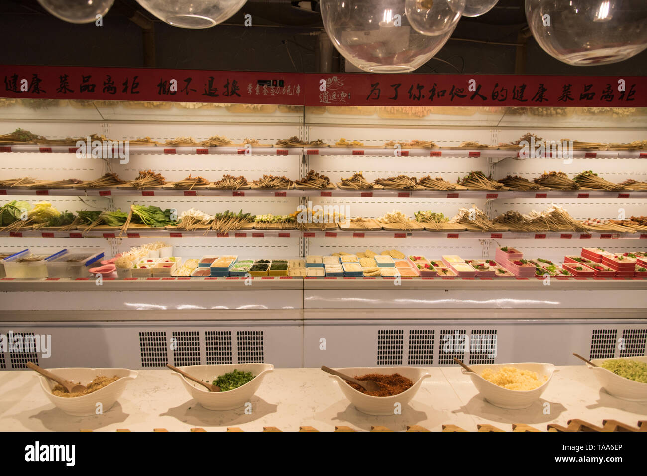 Interior of a restaurant at the food market in Chengdu, Sichuan, China ...