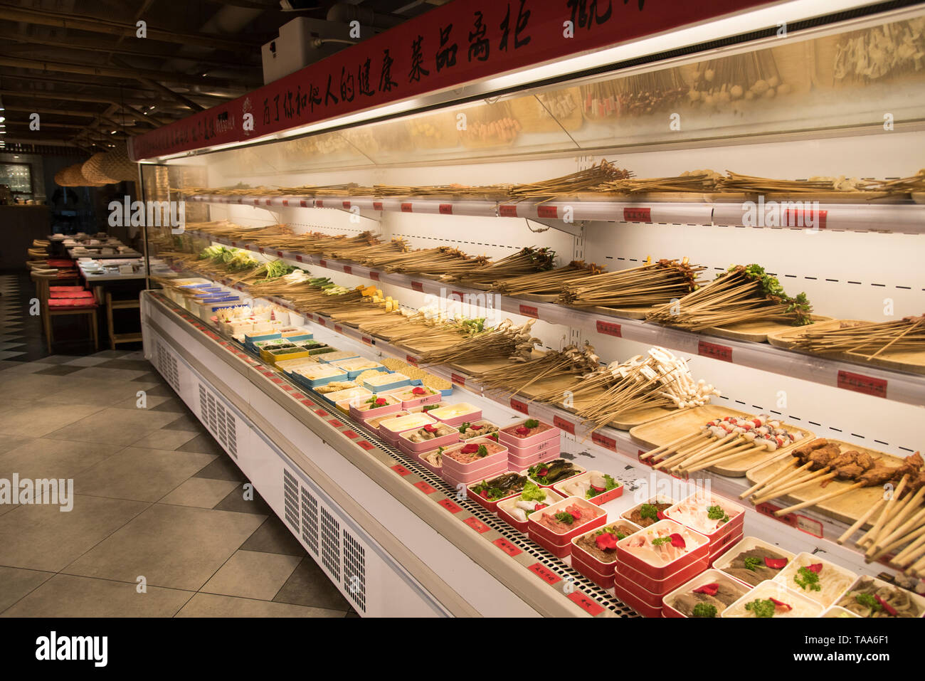 Interior of a restaurant at the food market in Chengdu, Sichuan, China ...