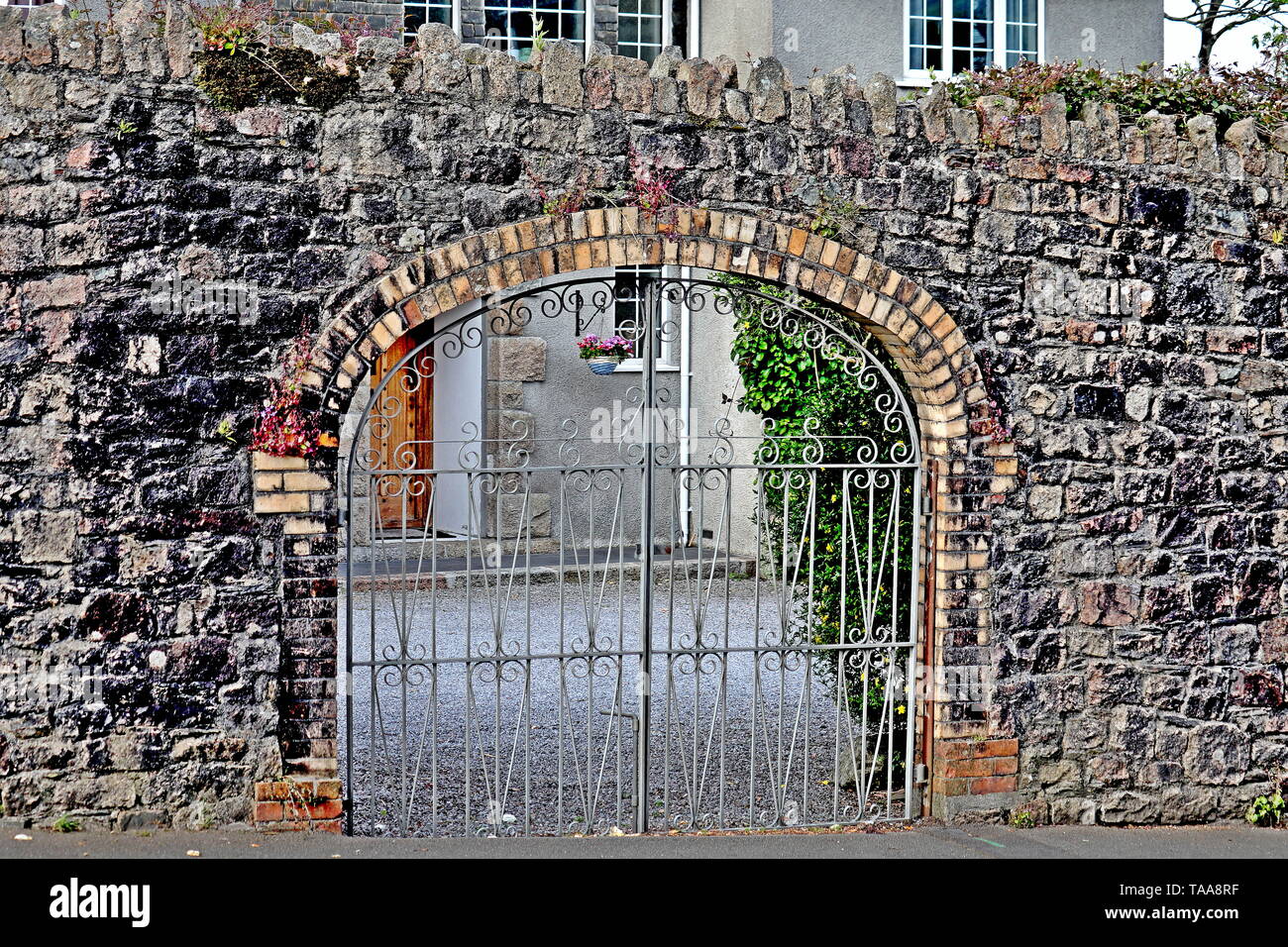 Wrought Iron Gates with their intricate design. Wrought iron is used ...