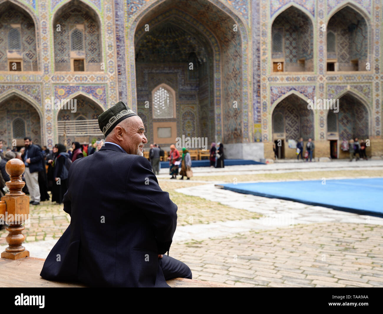 SAMARKAND, UZBEKISTAN - 22 APRIL 2019: The Uzbek tourist with the ...