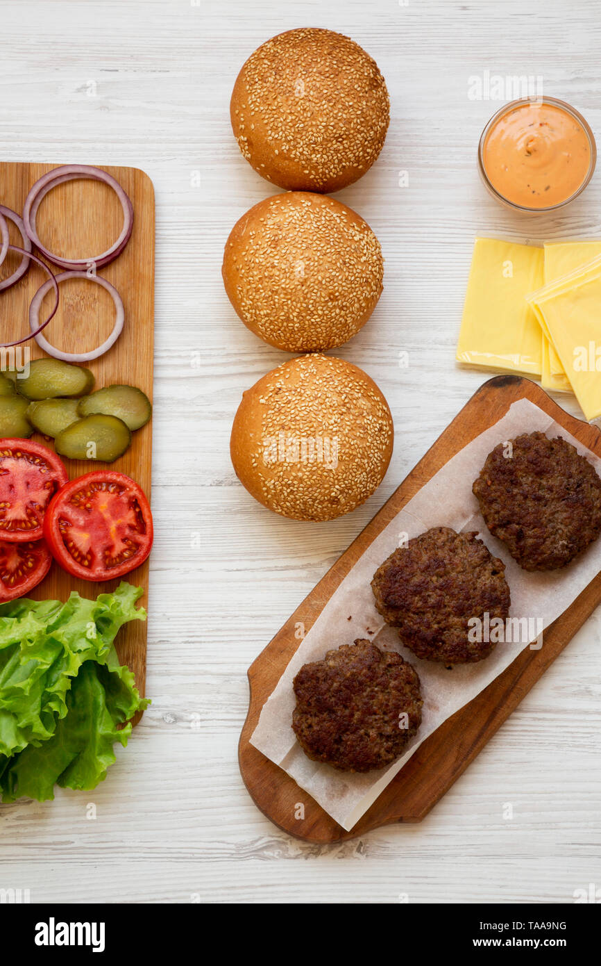 Cheeseburger ingredients, top view. Overhead, from above, flat lay ...