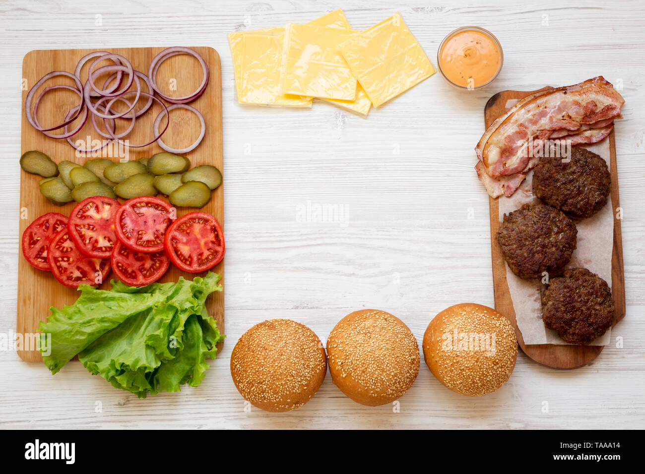 Cheeseburger ingredients, overhead view. From above, top view, flat lay ...