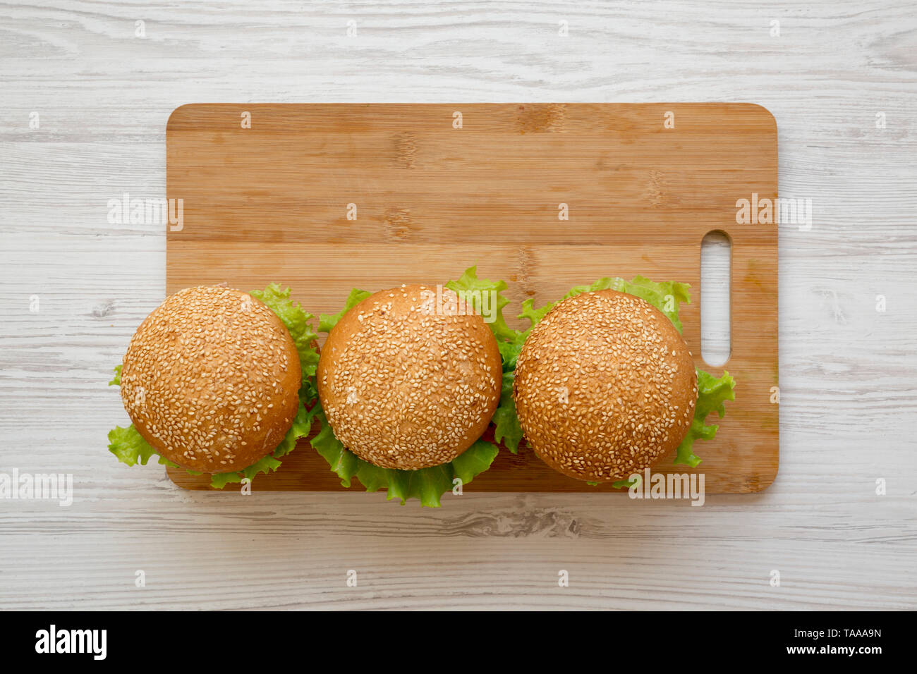 Cooking cheeseburger step-by-step, top view. Flat lay, from above ...
