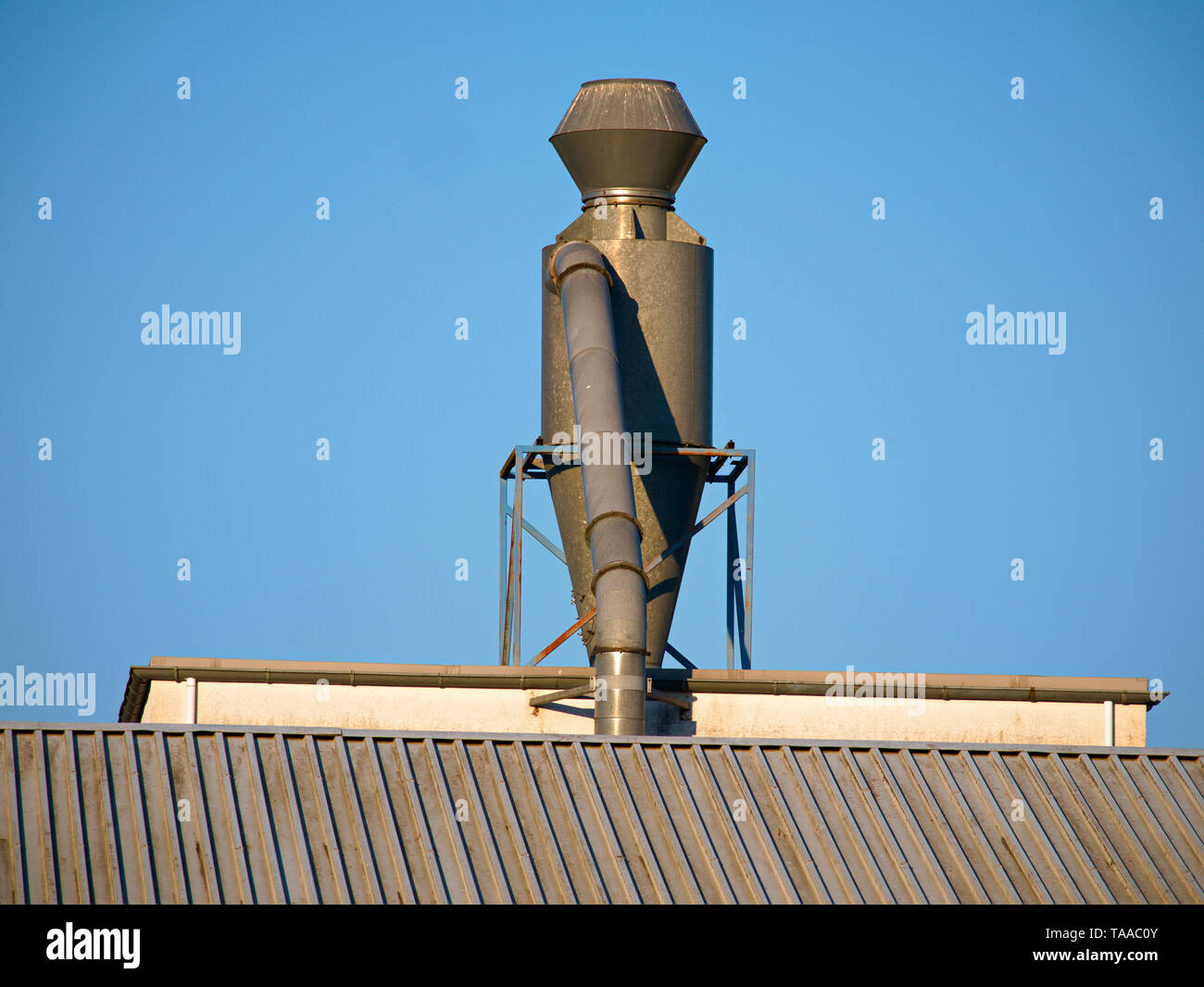 chimney of an industry building Stock Photo - Alamy
