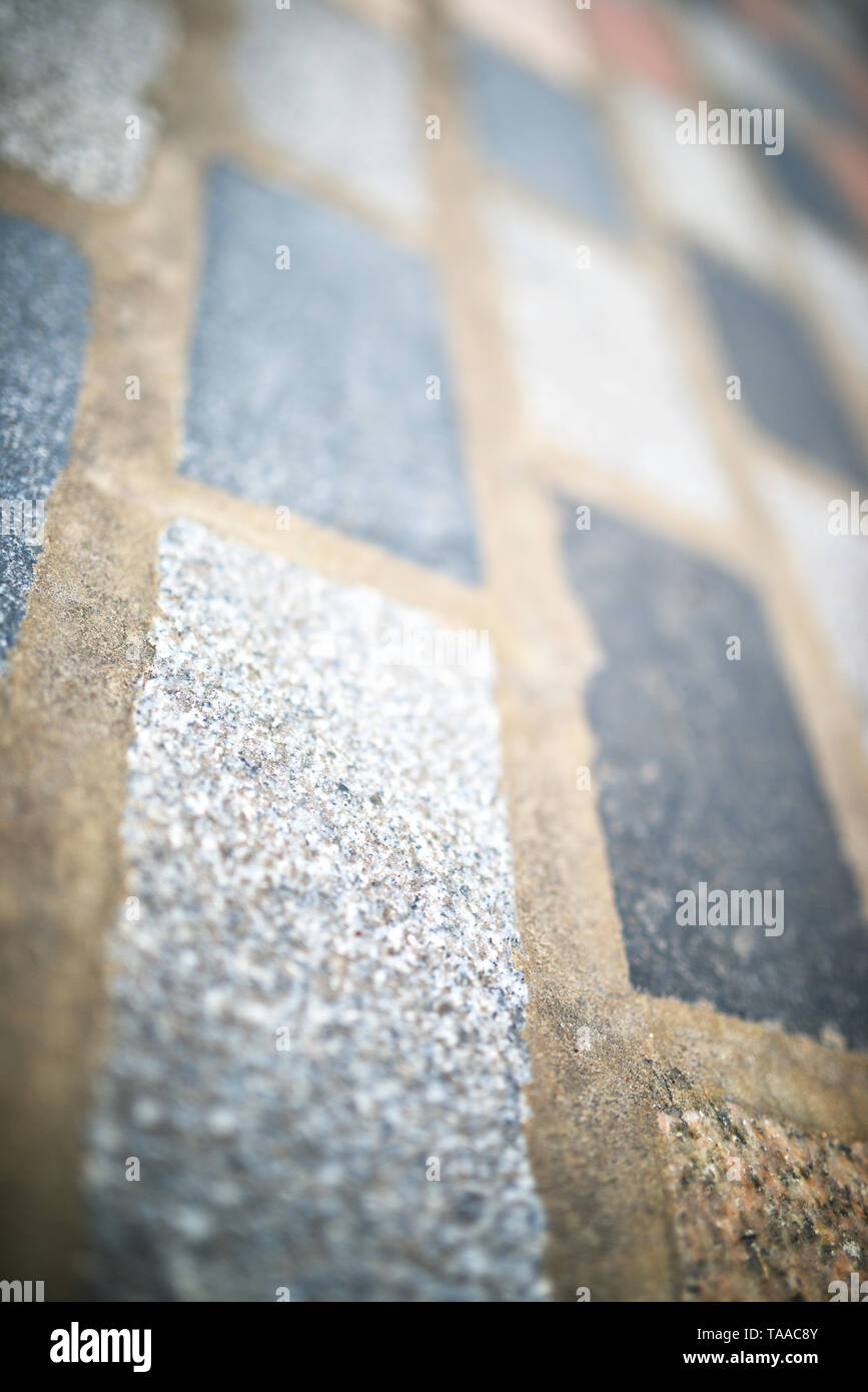 Floor of a street with stone tiles in London, England Stock Photo - Alamy