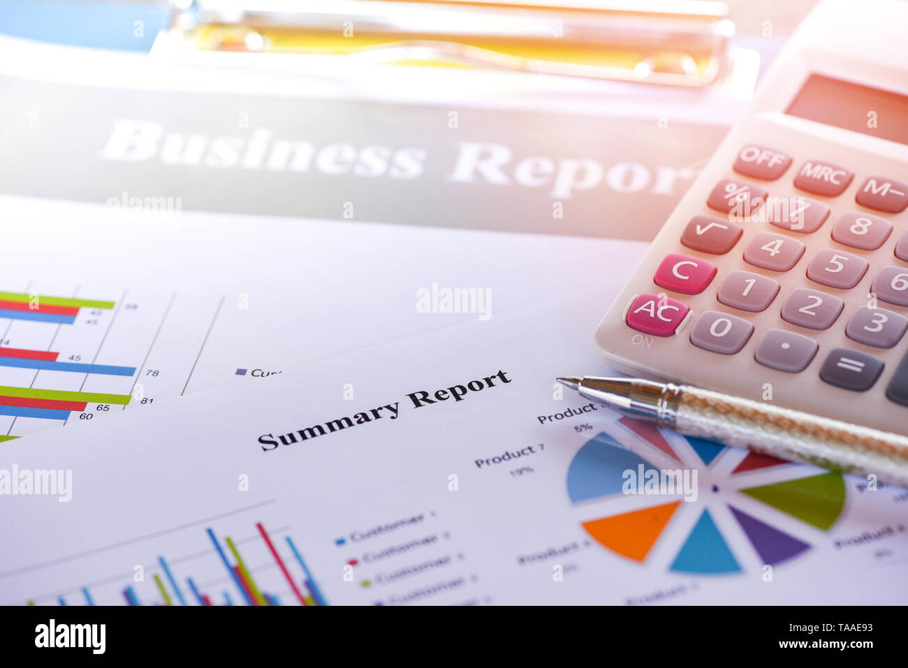 Business report chart preparing graphs calculator concept / Summary ...