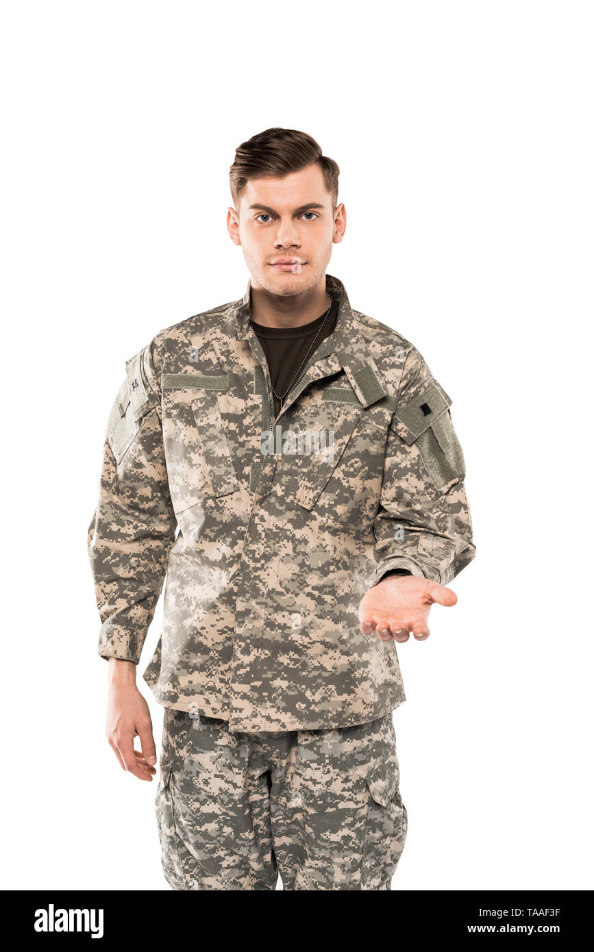 handsome man in military uniform gesturing isolated on white Stock ...