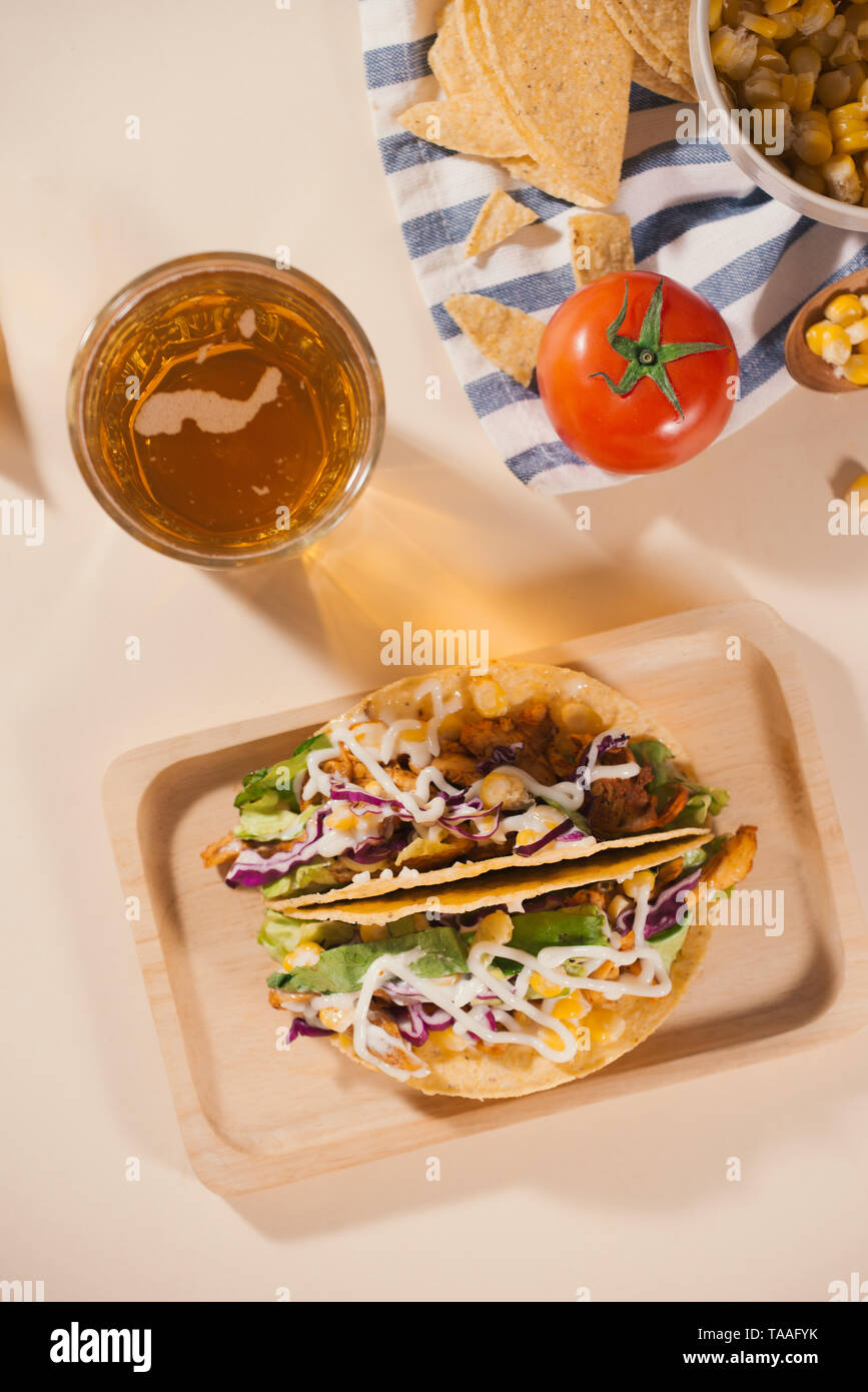 Traditional mexican taco with meat and vegetables. Latin american food ...