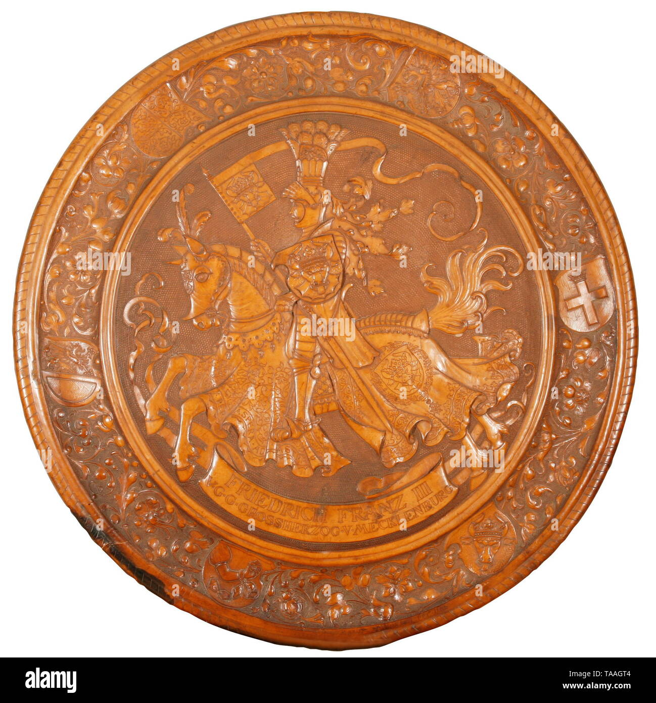 An elaborate, shield-shaped wall decoration from the possessions of the ...