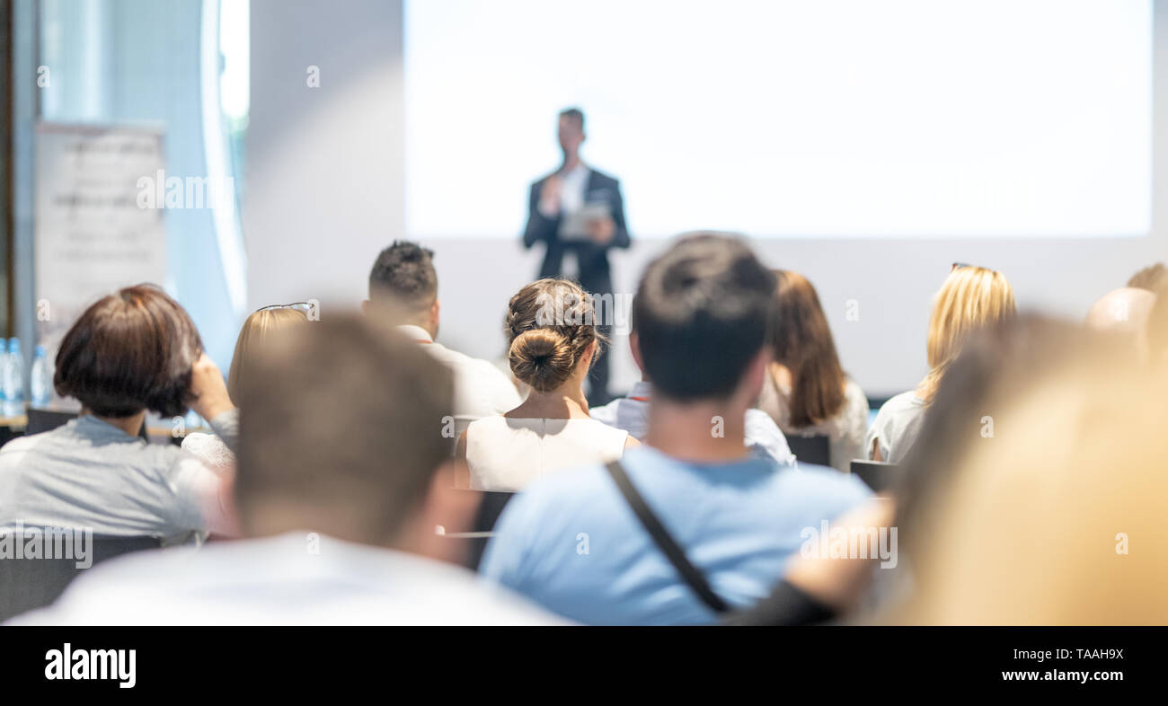 Male business speaker giving a talk at business conference event Stock ...