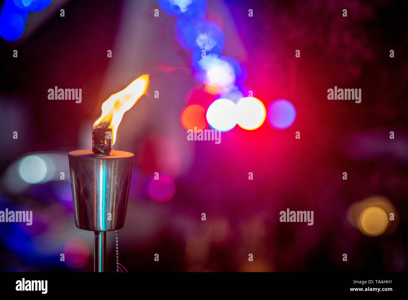 Flaming torch in golden hi-res stock photography and images - Alamy