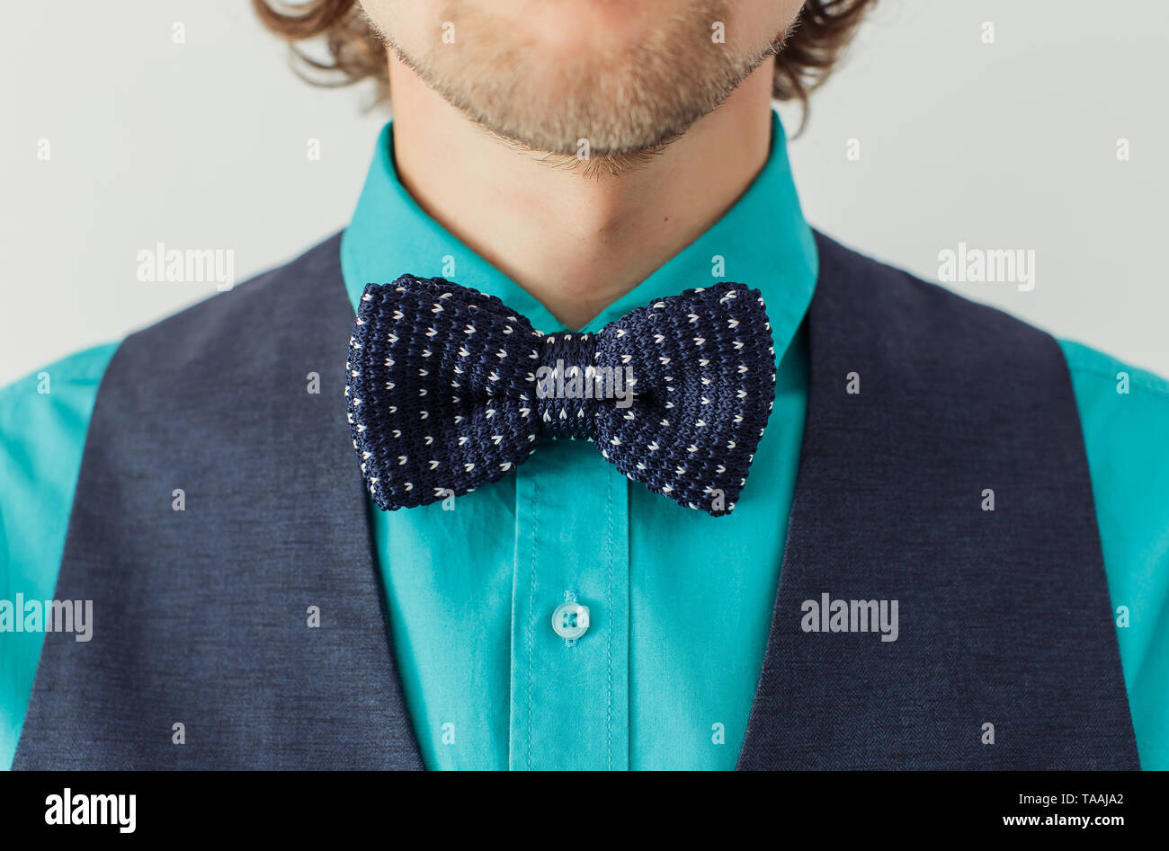 Man in suit wearing bowtie hi-res stock photography and images - Alamy
