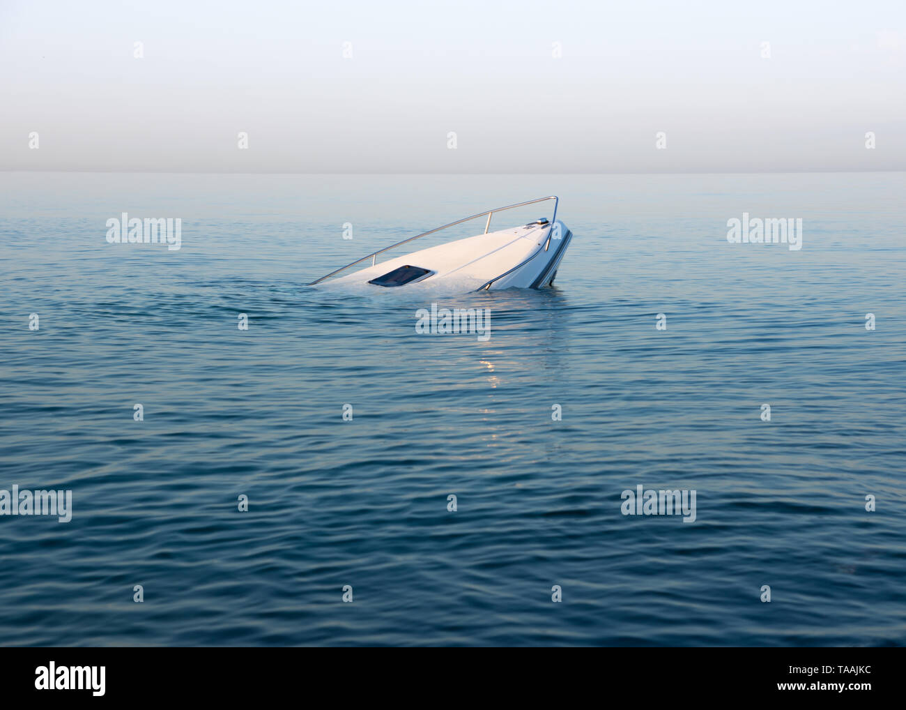 Sinking modern large white boat goes underwater Stock Photo - Alamy