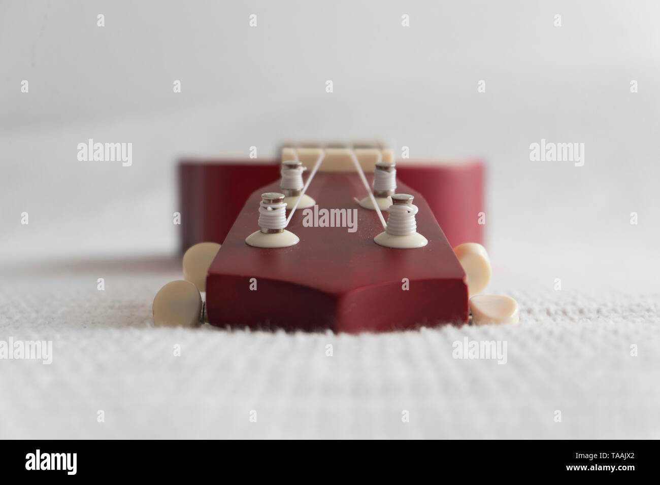 Red ukulele hi-res stock photography and images - Alamy