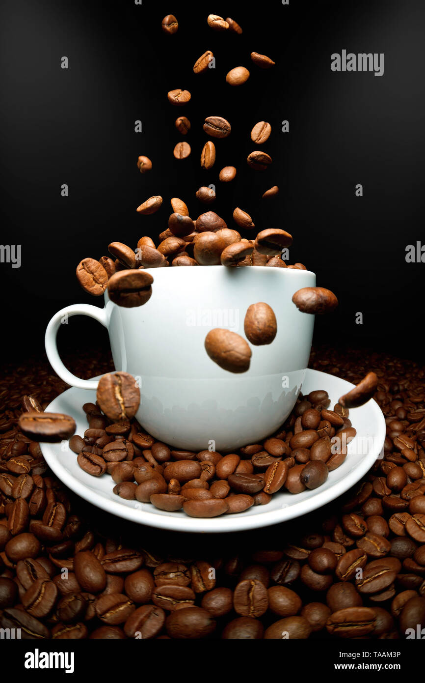 falling coffee beans Stock Photo - Alamy