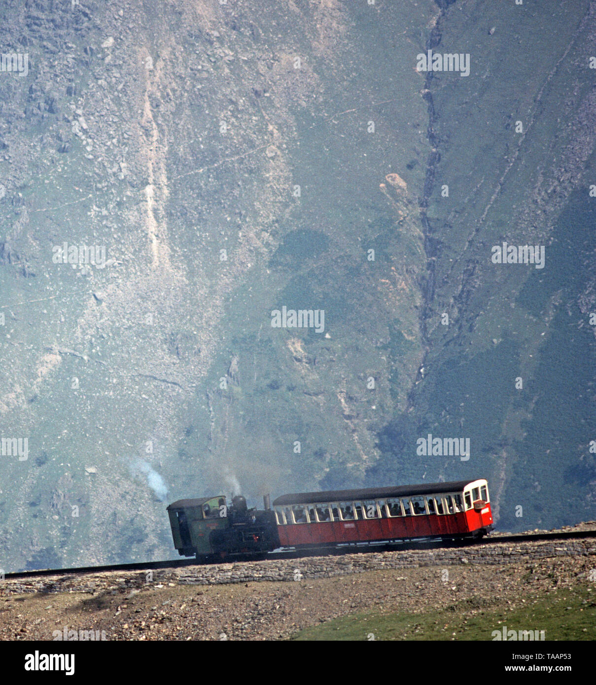 Snowdon Mountain Railway rack and pinion steam locomotive on way to Mount Snowdon summit ...