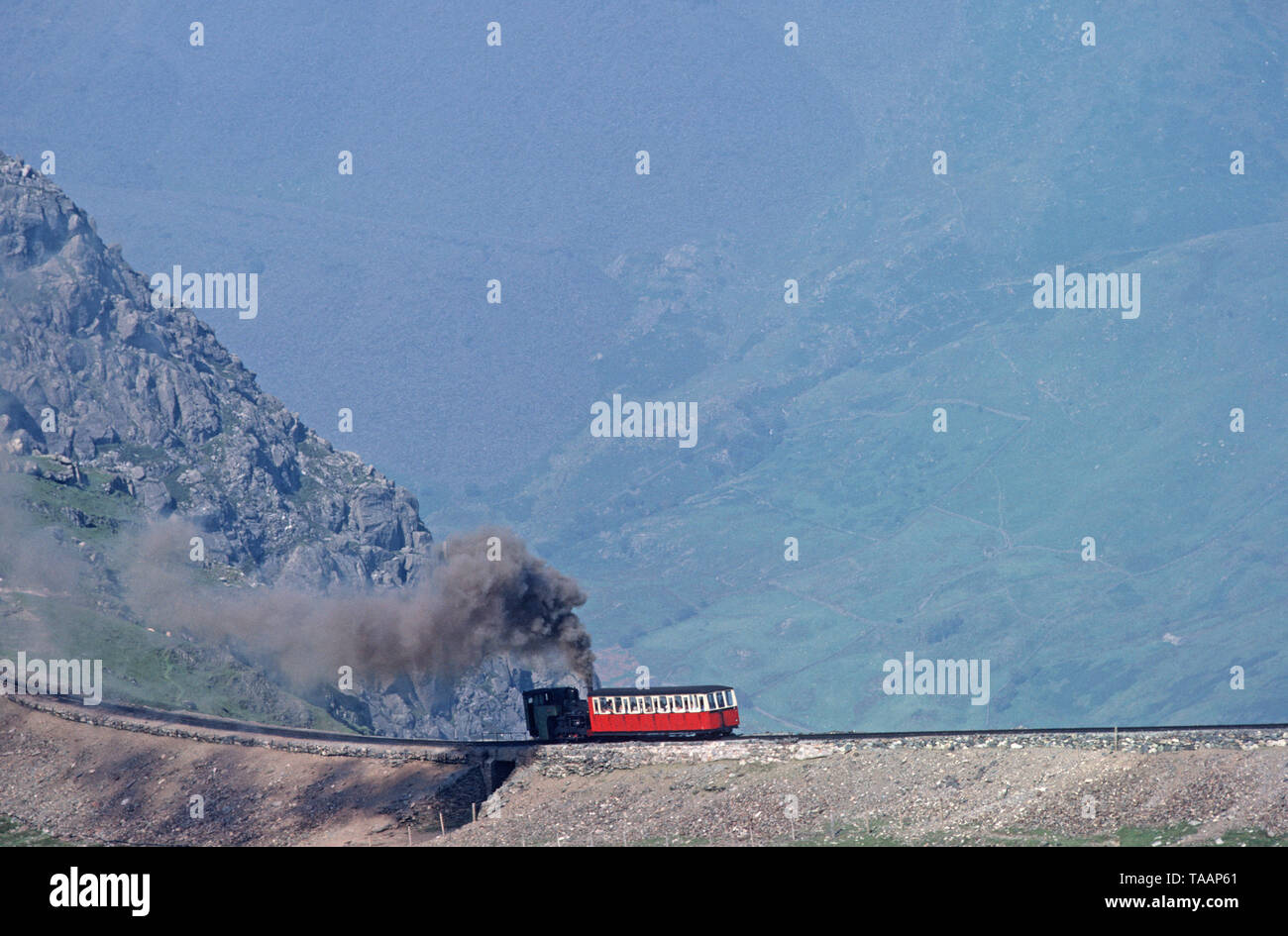 Snowdon Mountain Railway rack and pinion steam locomotive on way to Mount Snowdon summit ...