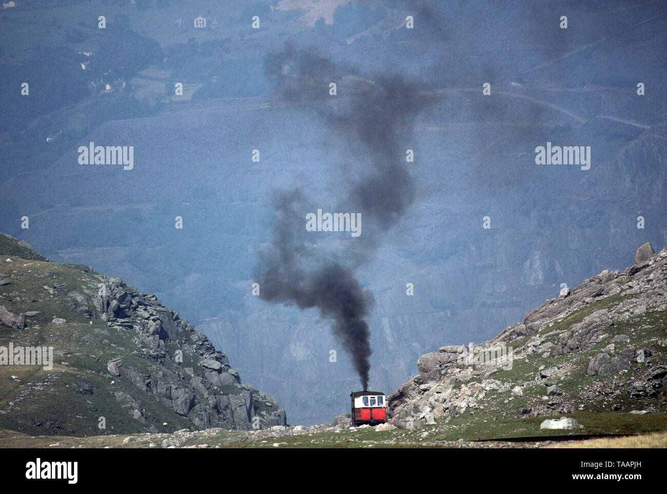 Snowdon Mountain Railway rack and pinion steam locomotive on way to Mount Snowdon summit ...