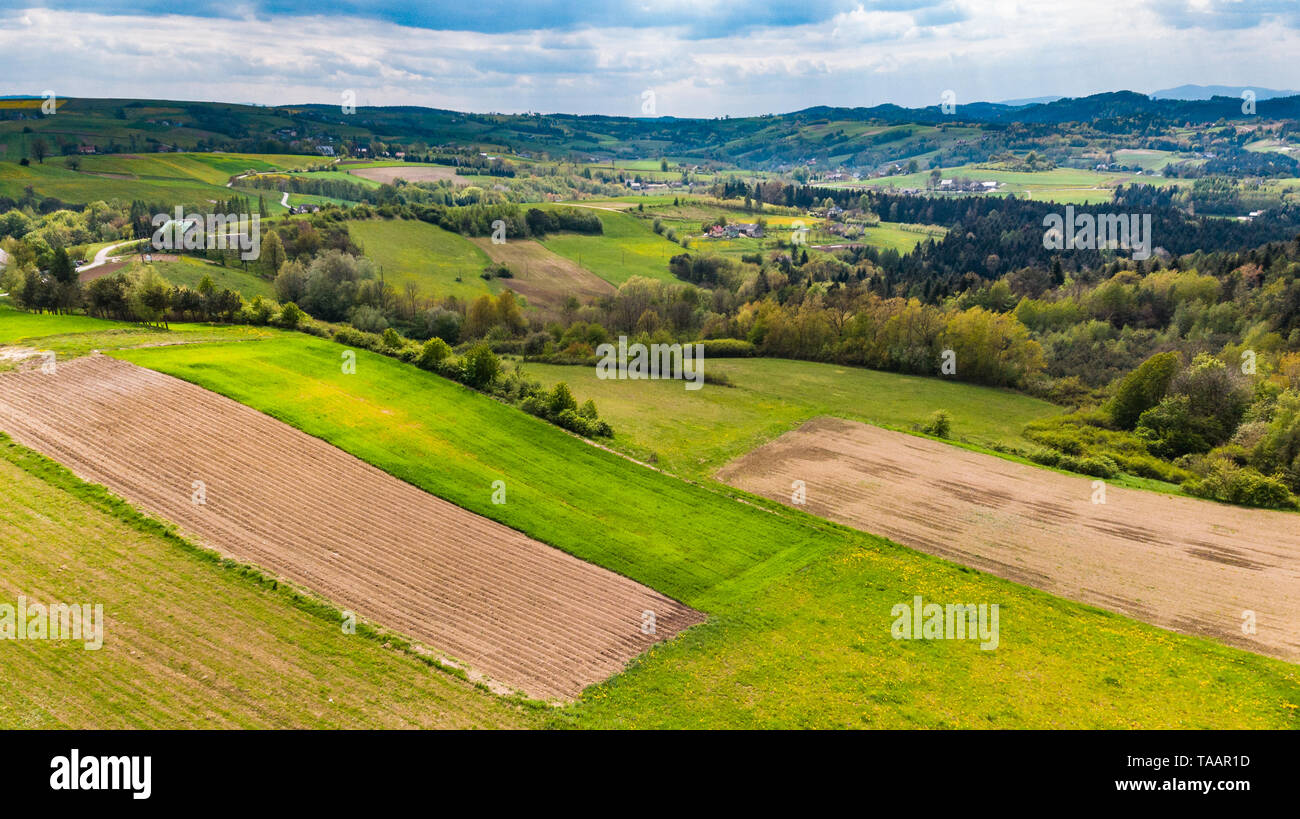 Farmlands and mountains in rural Poland seen from drone Stock Photo - Alamy